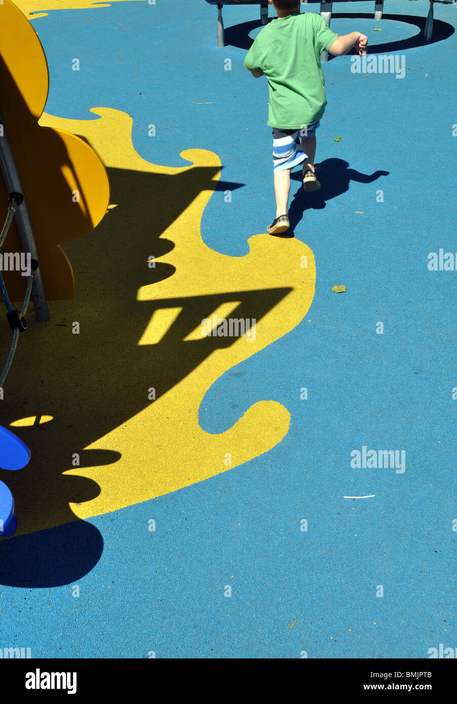 Boy running in Playground,children, colorful, equipment, jungle gym ...