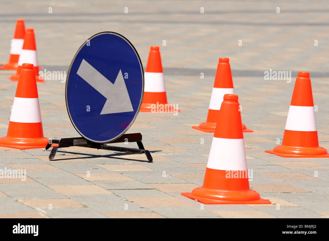 Traffic cones and road sign Stock Photo - Alamy