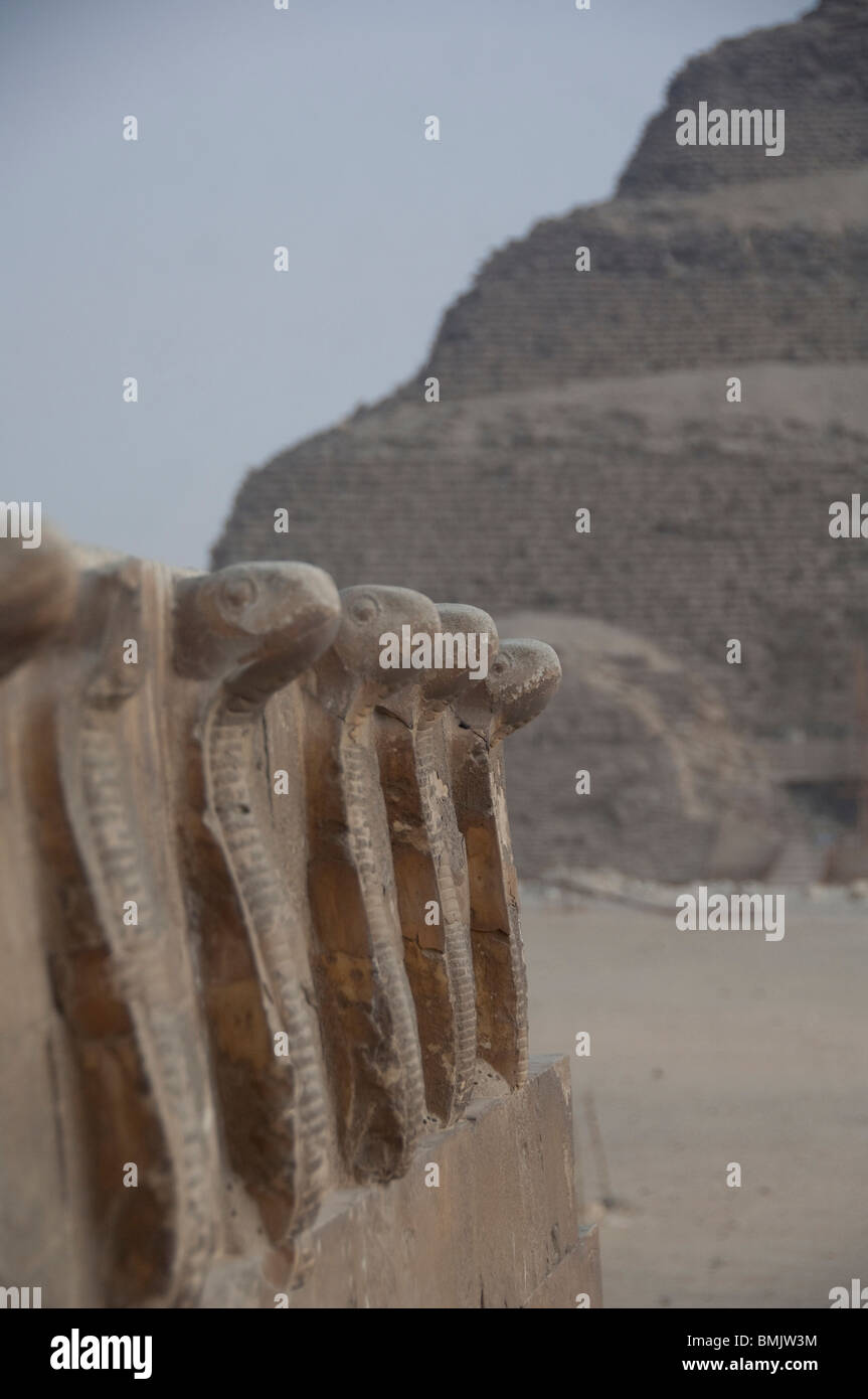 Egypt, Saqqara. Facade of the Cobra Palace with Zoser pyramid in the ...