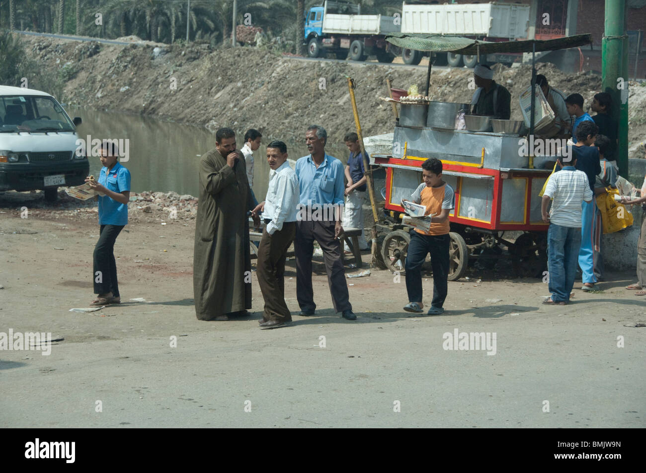 Egypt, Cairo. Everyday life in downtown Cairo. Local street food vendor ...