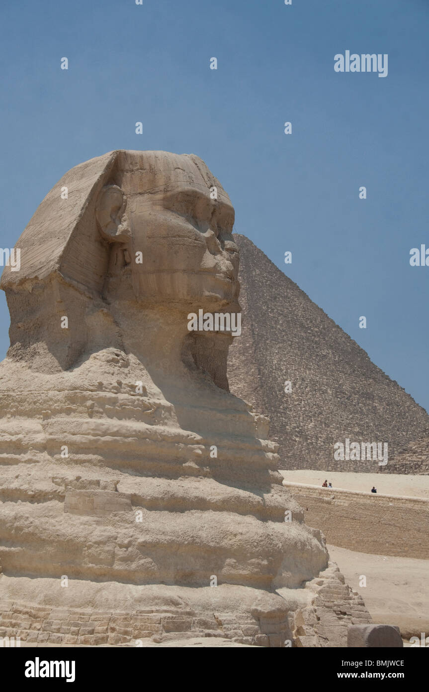 Egypt, Cairo. The Sphinx in front of the Great Pyramids of Giza Stock ...