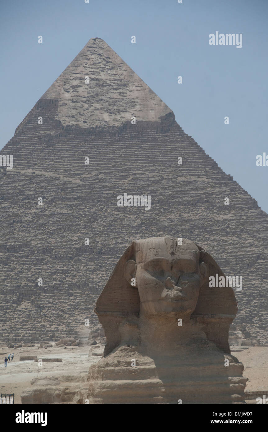 Egypt, Cairo. The Sphinx in front of the Great Pyramids of Giza Stock ...