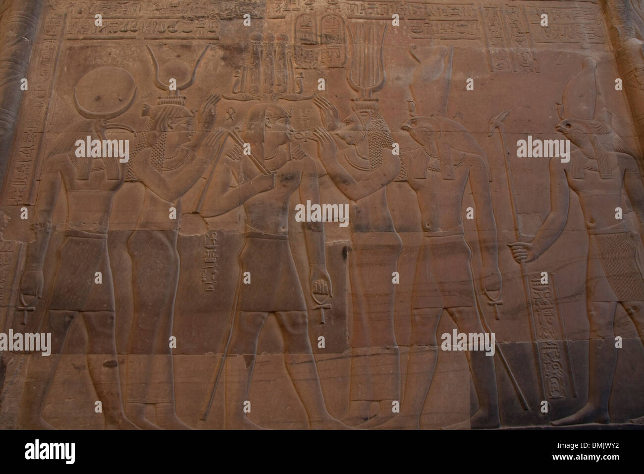 Bas-relief of Thoth, Nut, Ptolemy VIII, Isis, Horus and Ra on a wall of ...