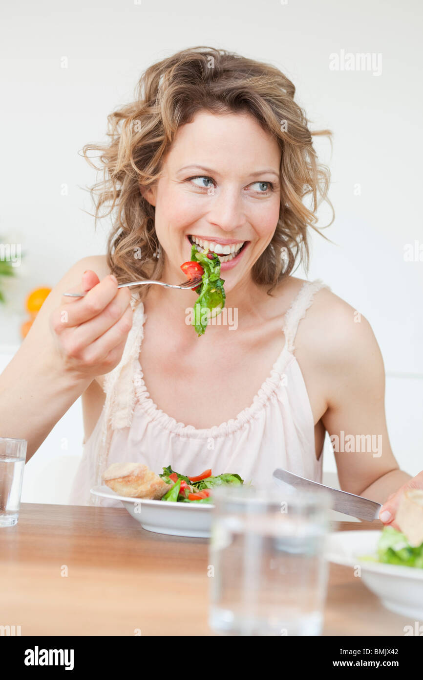 Biting fork woman hi-res stock photography and images - Alamy
