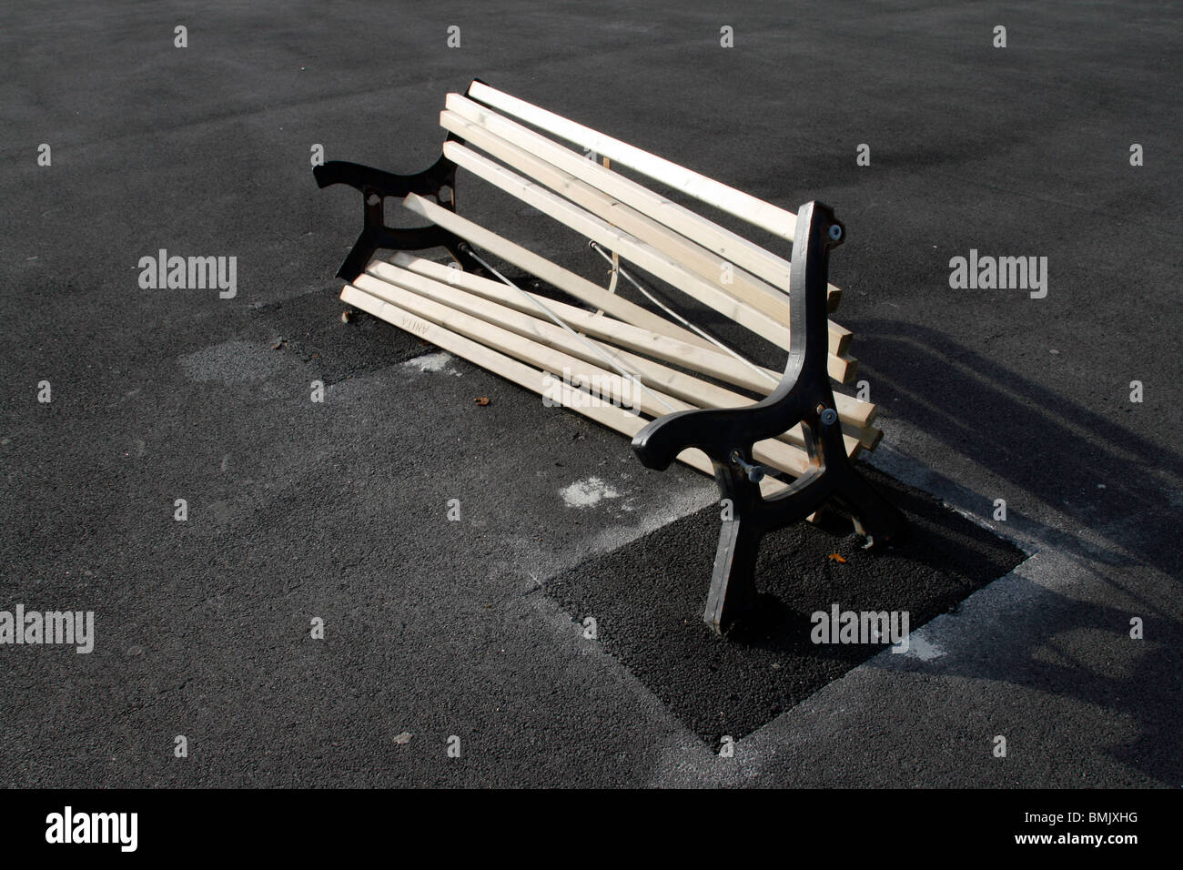 damaged park bench in city town Stock Photo - Alamy