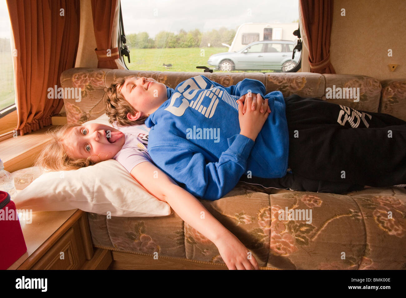Children enjoying Caravan holiday playing Stock Photo - Alamy