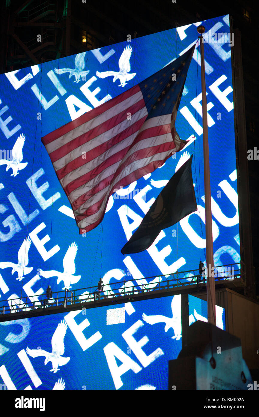An American Flag flies in Times Square New York Stock Photo - Alamy