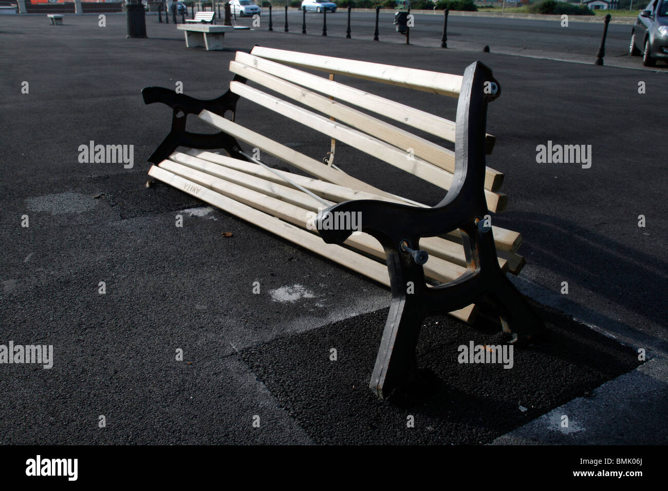 damaged park bench in city town Stock Photo - Alamy