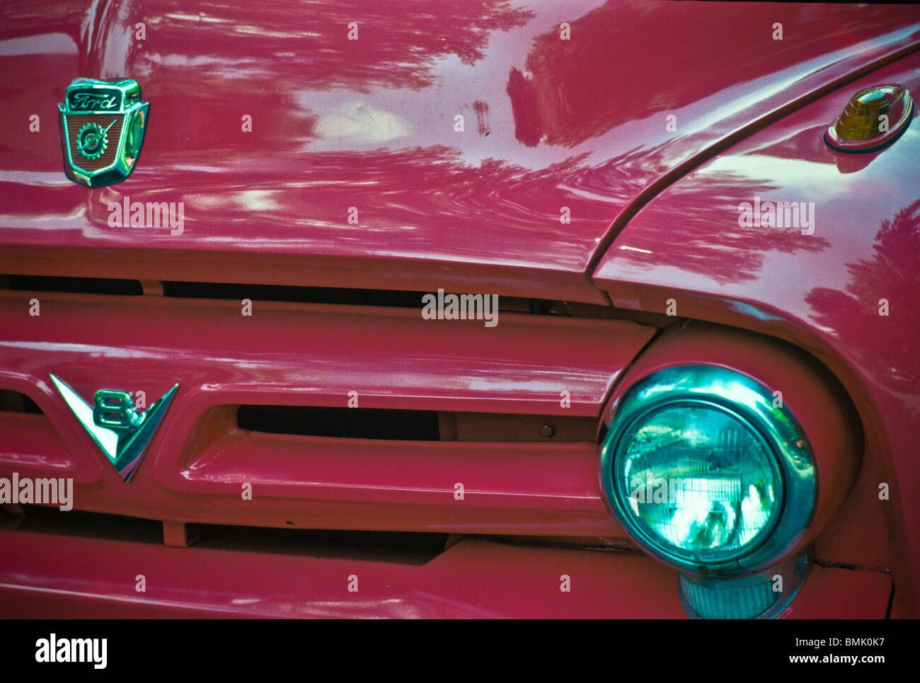 Close up of automobile front grill V8 insignia logo Stock Photo - Alamy