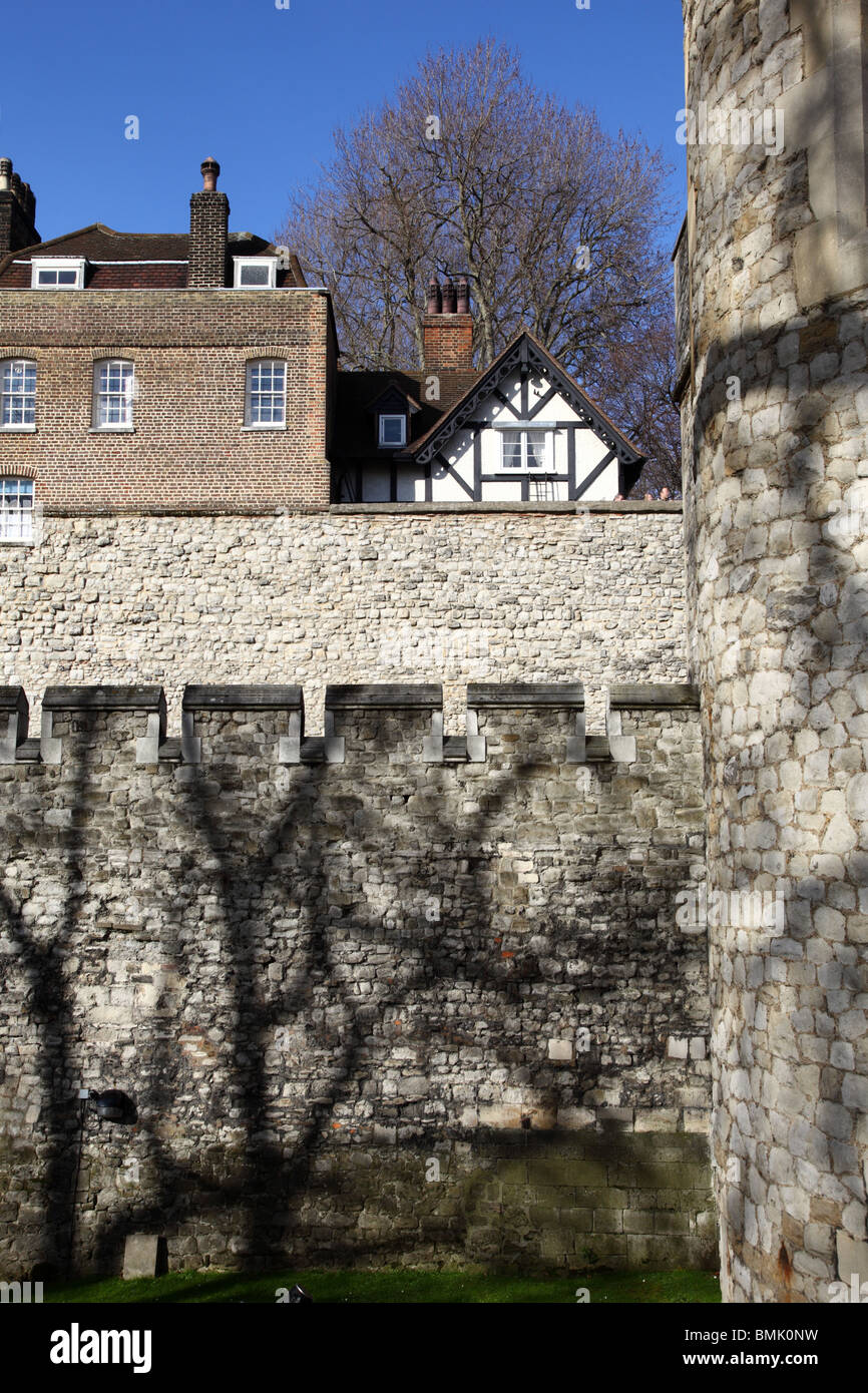 View of the Tower of London with the shadows of trees cast against the ...