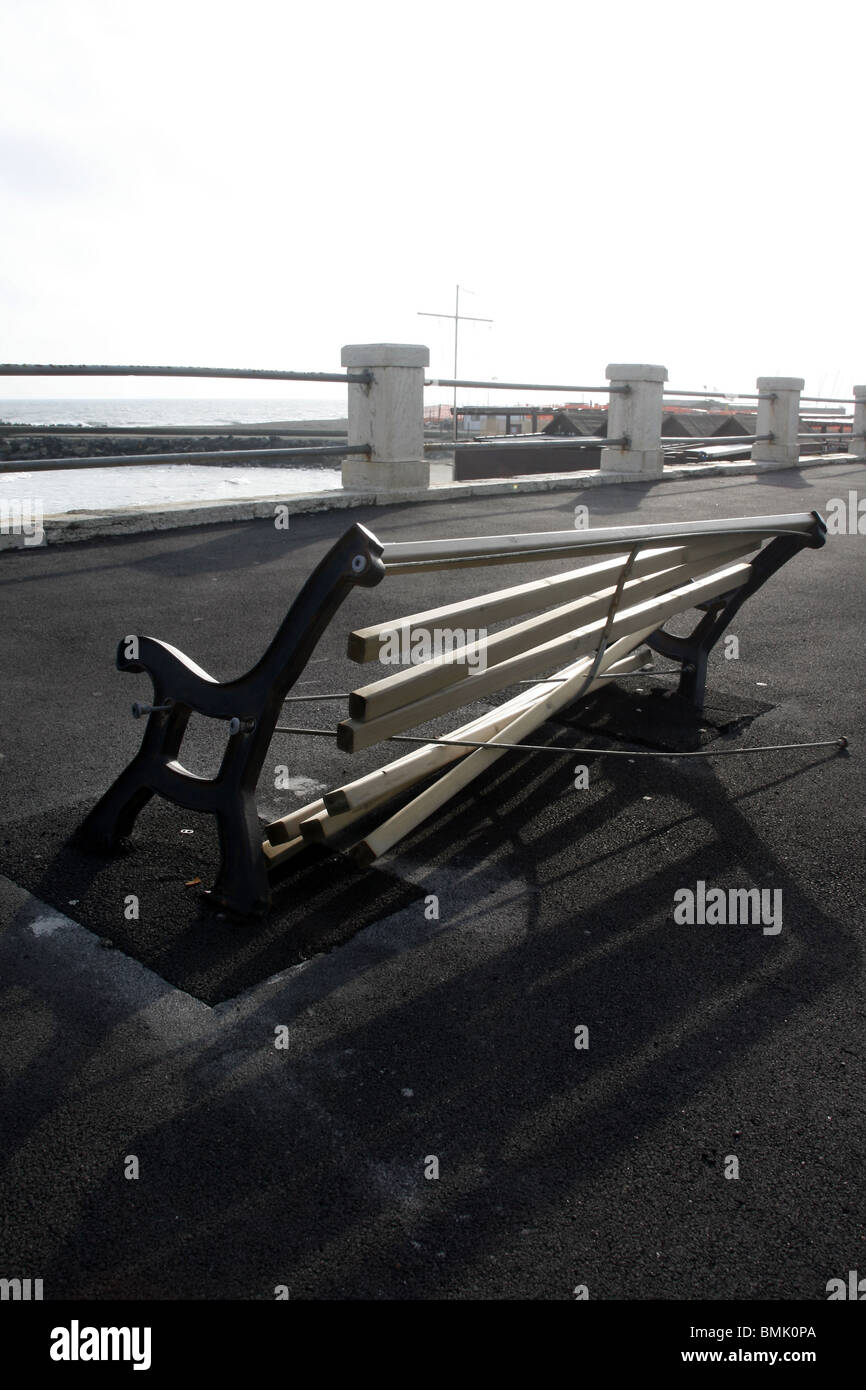 damaged park bench in city town Stock Photo - Alamy