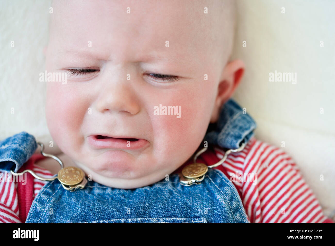 Baby wailing hi-res stock photography and images - Alamy