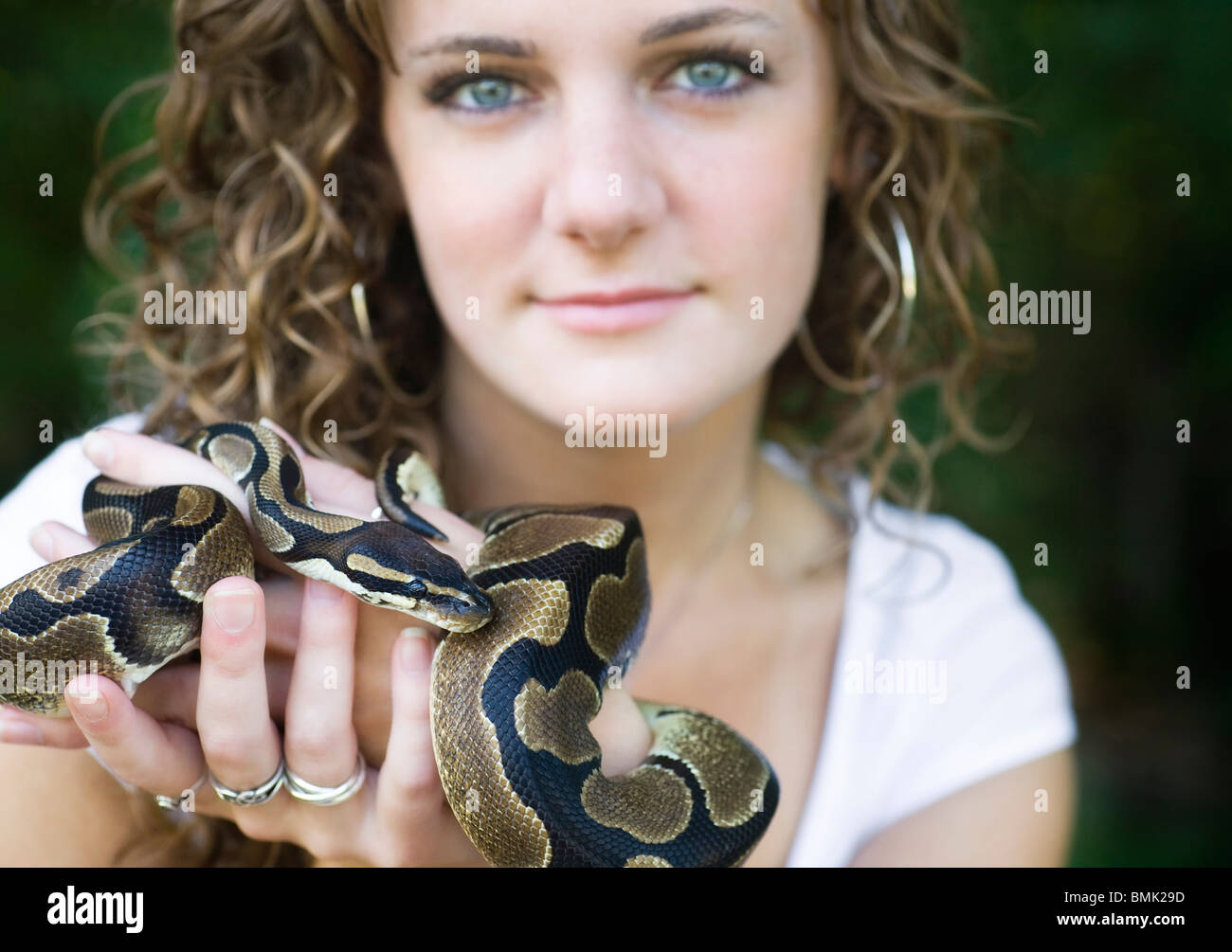 Female holding snake hi-res stock photography and images - Alamy