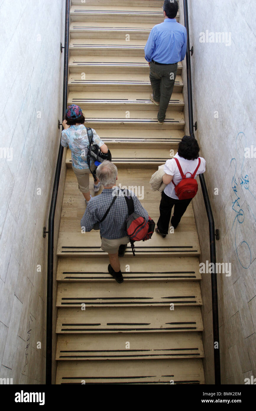 Group people climbing stairs street hi-res stock photography and images ...