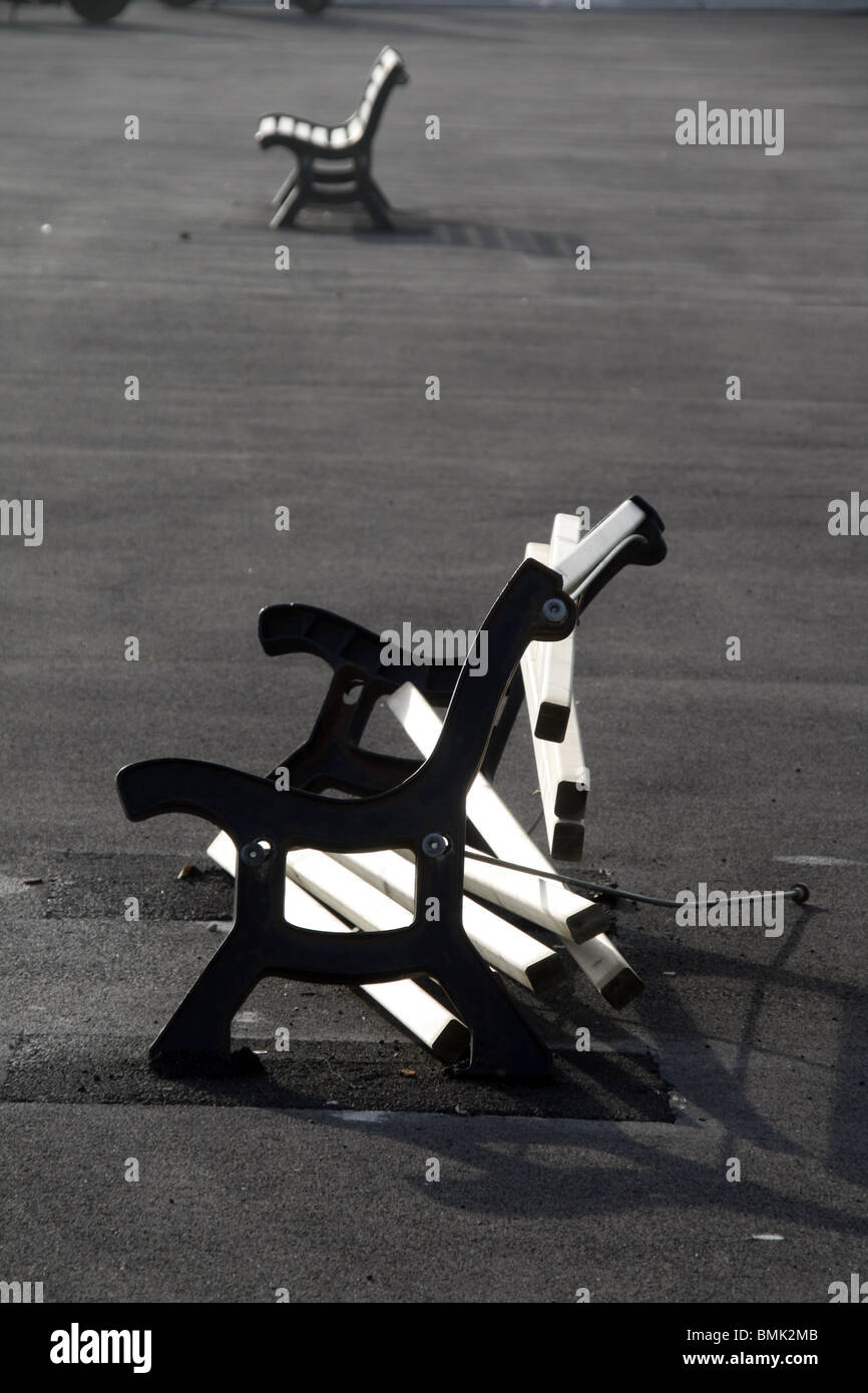 damaged park bench in city town Stock Photo - Alamy