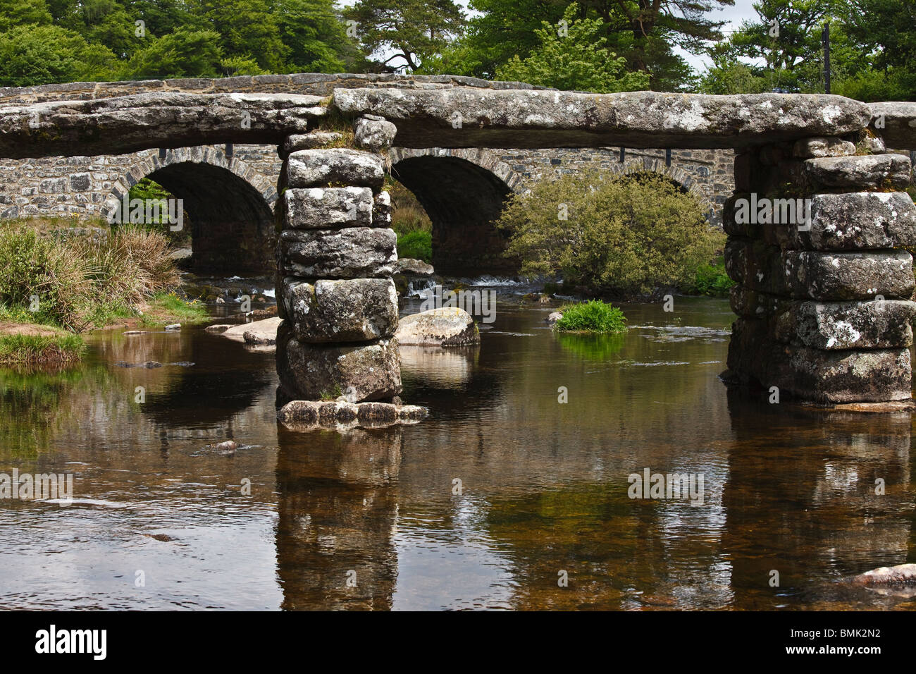 The medieval Clapper Bridge together with the road bridge over the East ...