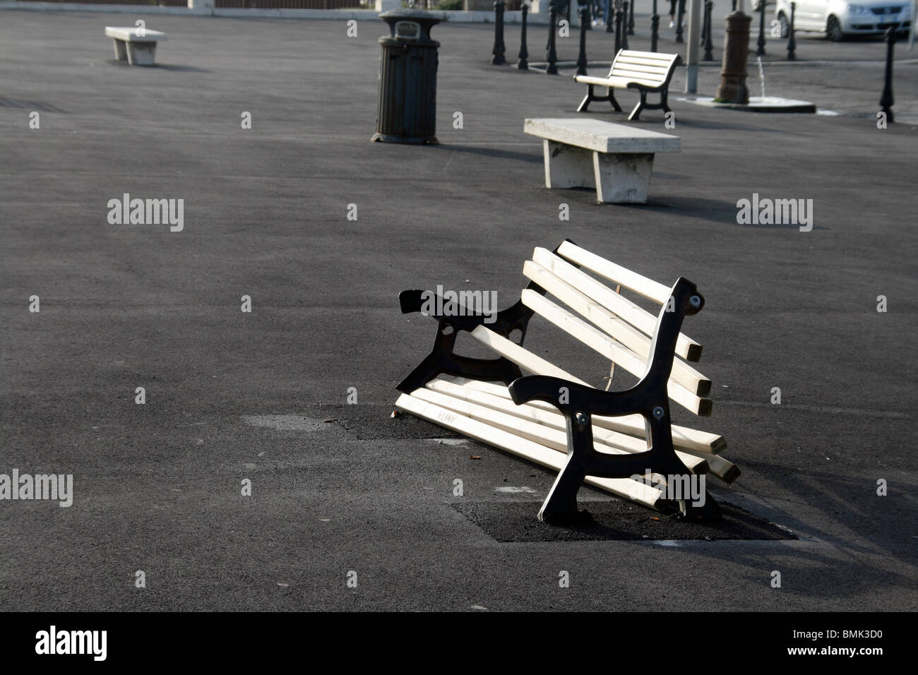 damaged park bench in city town Stock Photo - Alamy