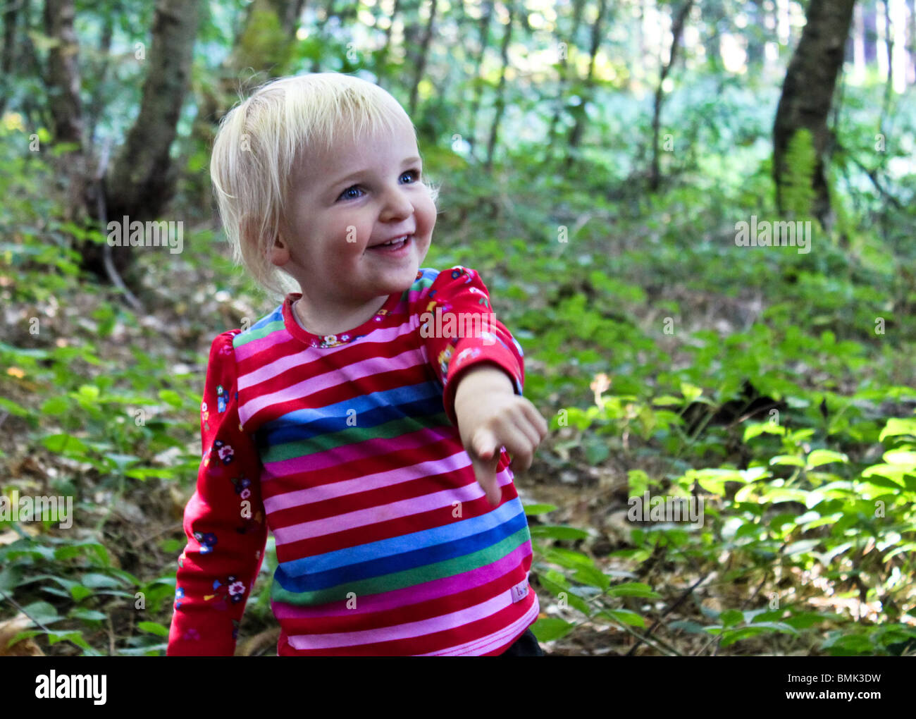 Happy toddler pointing Stock Photo - Alamy