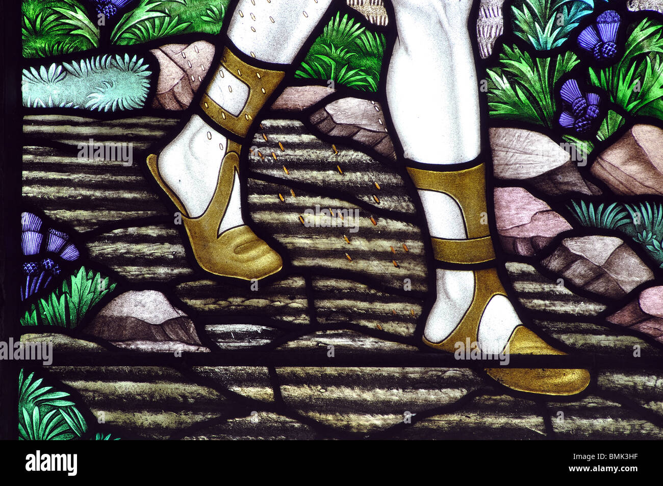 Detail of stained glass showing the Sower`s feet with sandals, St ...