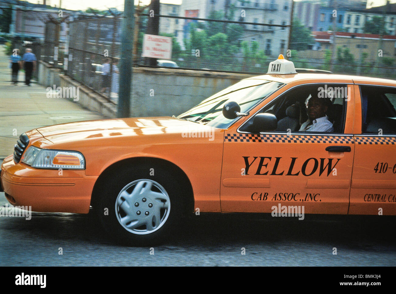 side view yellow taxi NYC Stock Photo - Alamy