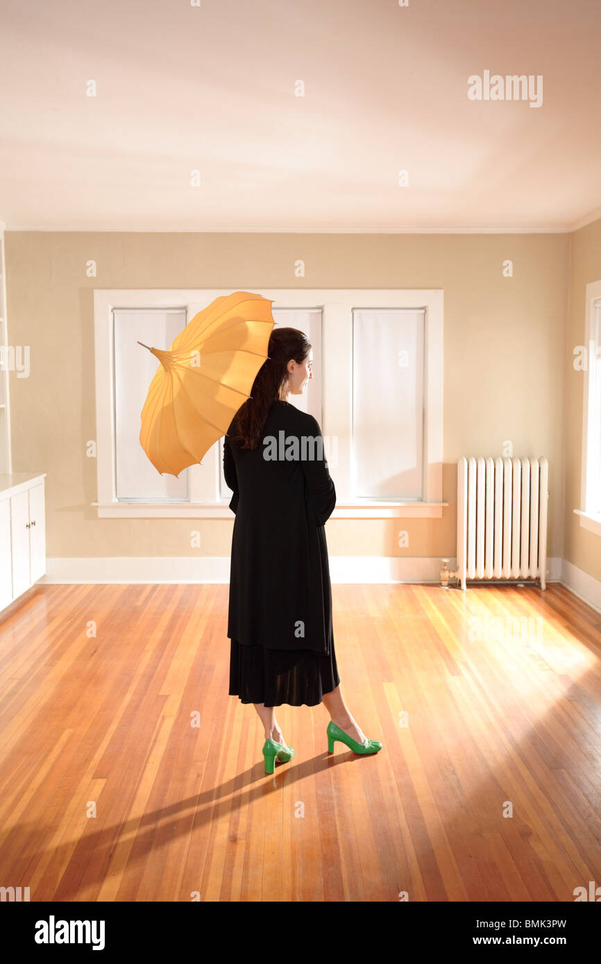 Woman with parasol hi-res stock photography and images - Alamy