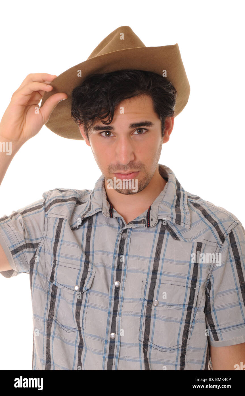 Young Man wearing a Cowboy hat isolated over white Stock Photo - Alamy