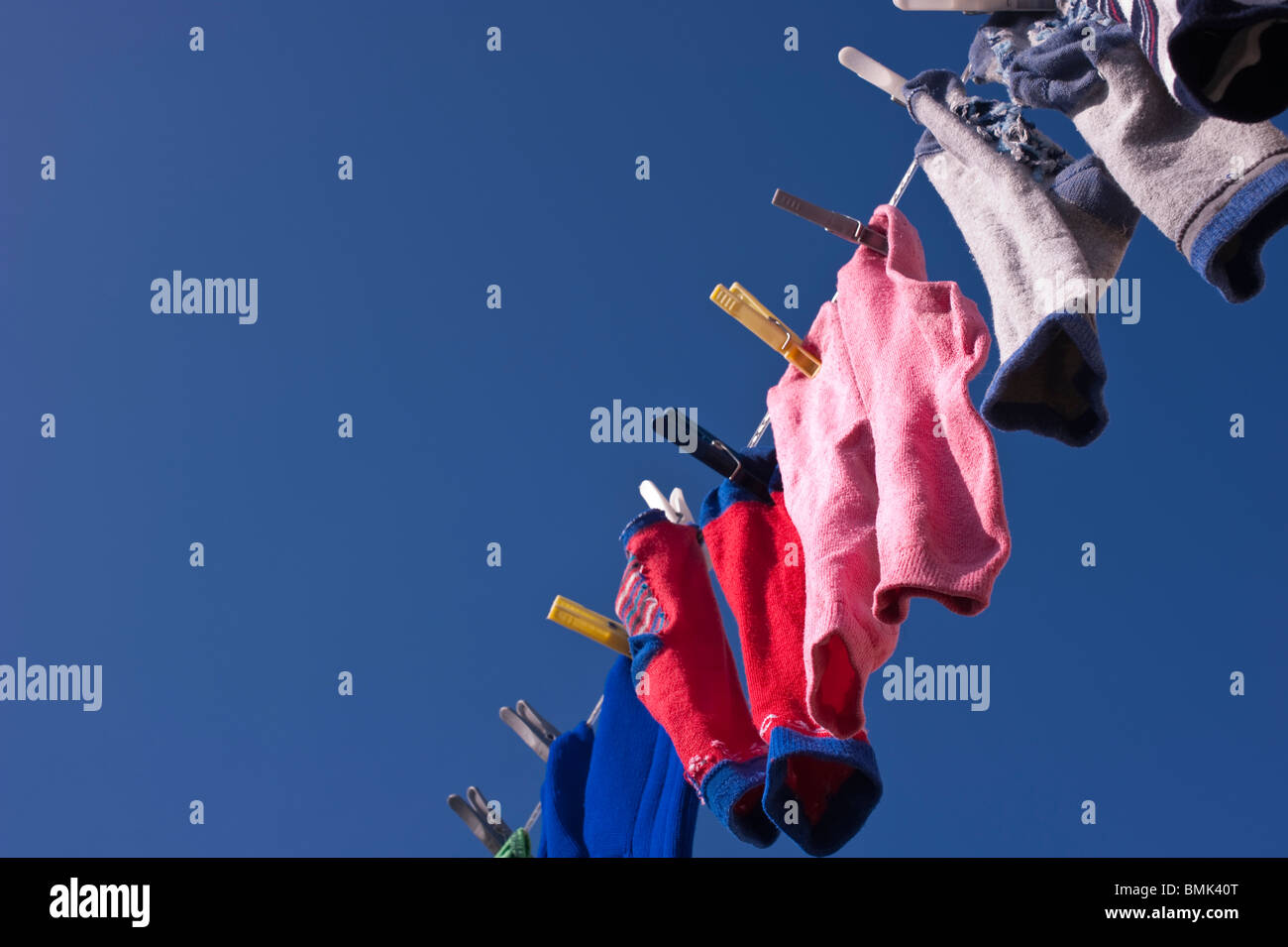 Socks on a washing line Stock Photo - Alamy