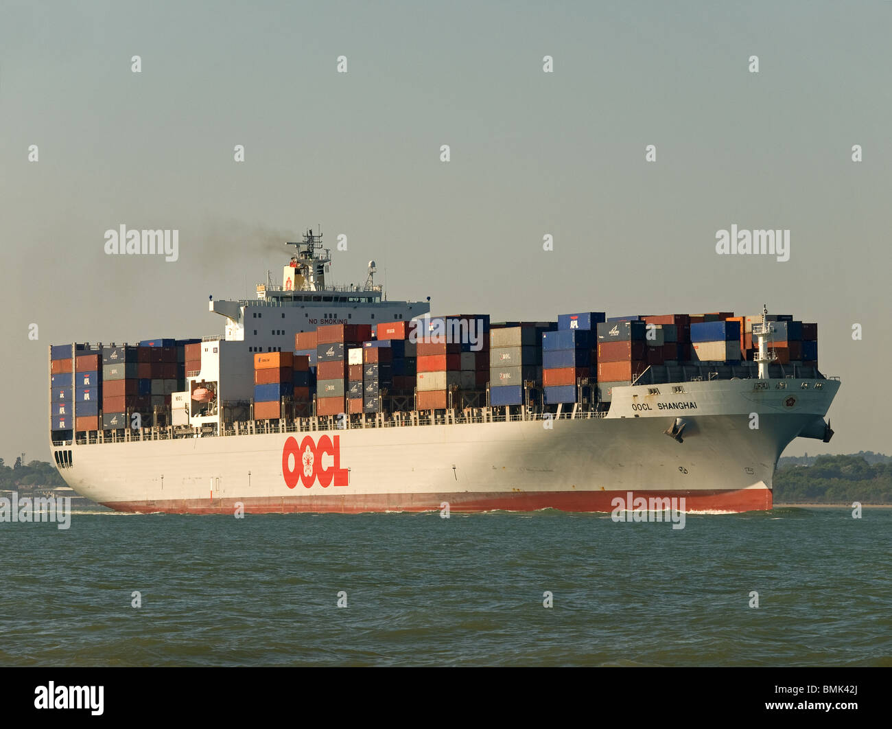 Container ship OOCL Shanghai leaving Southampton England UK Stock Photo - Alamy