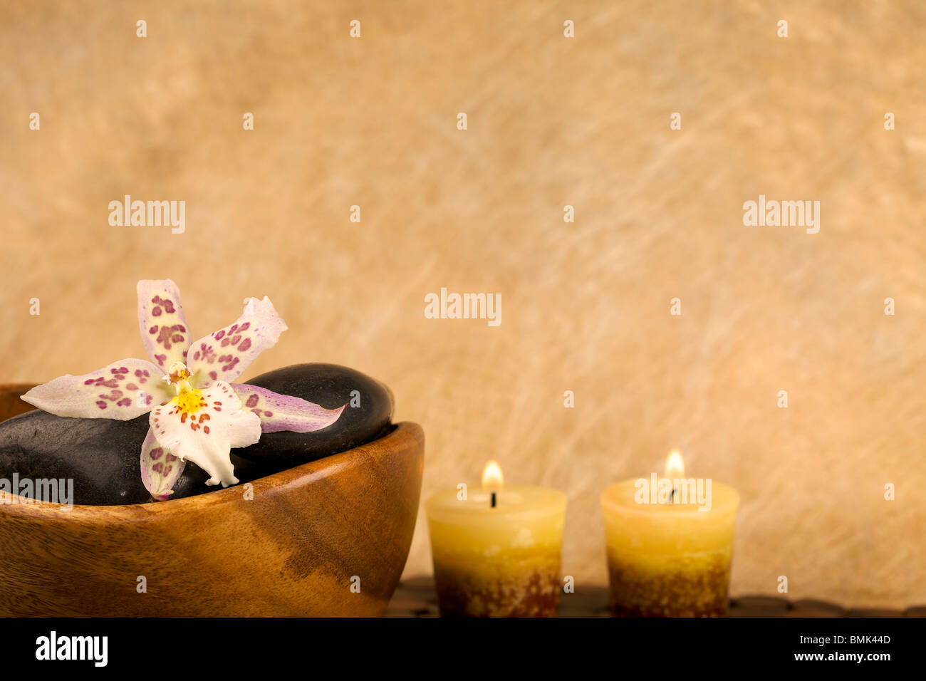Zen-like scene with flower and candles Stock Photo - Alamy