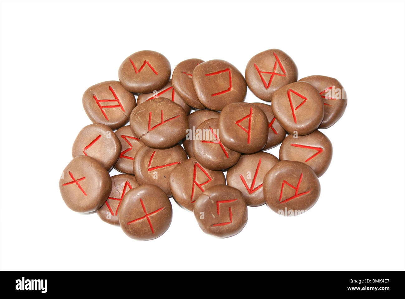 full collection of hand made runes stones with red symbols carved into ...