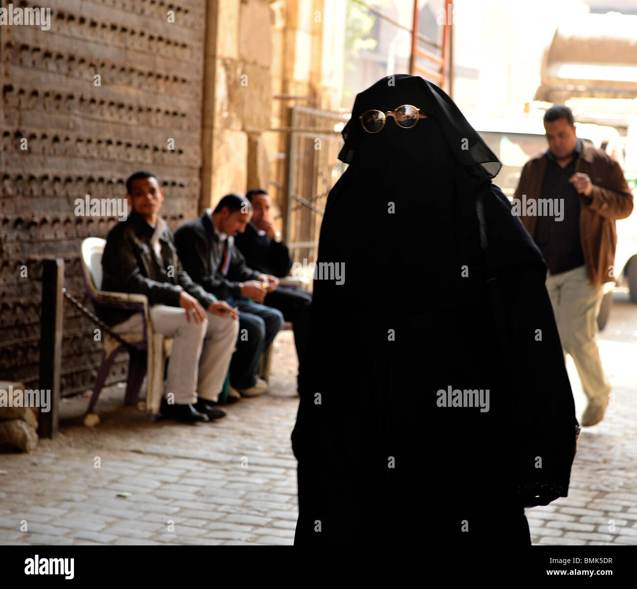 muslim egyptian lady in traditional clothing , early morning scene ...