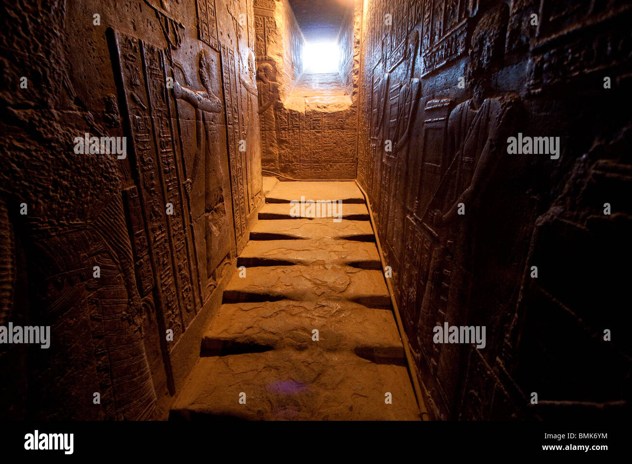 Bas-reliefs in a passage leading to the roof of the Temple of Hathor ...