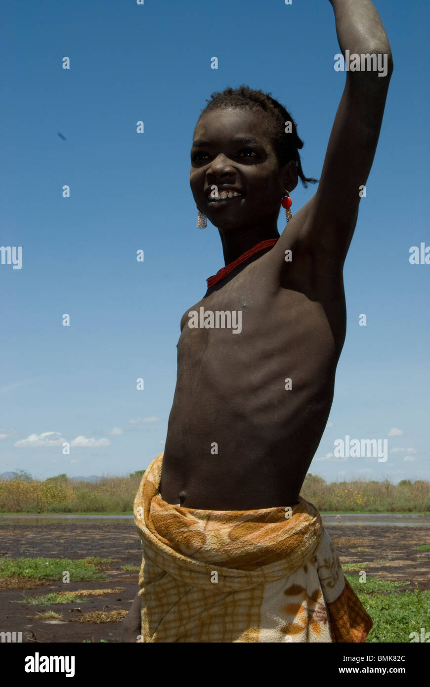 Ethiopia, Lower Omo River Basin, Omo Delta, portrait in Dassenech village of young boy Stock ...
