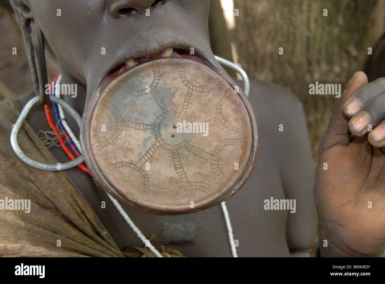Lip plug hi-res stock photography and images - Alamy