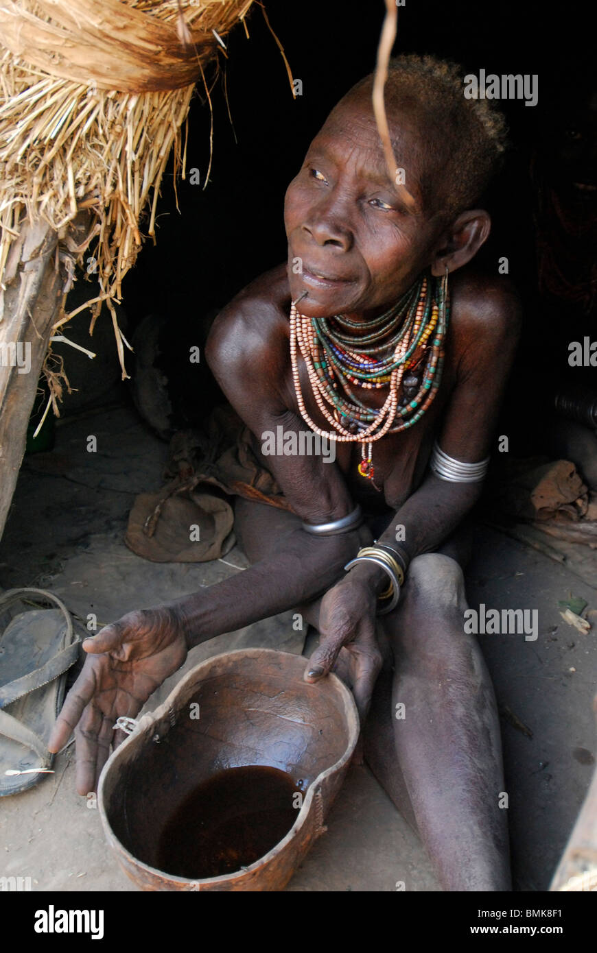 Ethiopia: Omo River Basin, Duss, a Karo tribal village, older woman in ...
