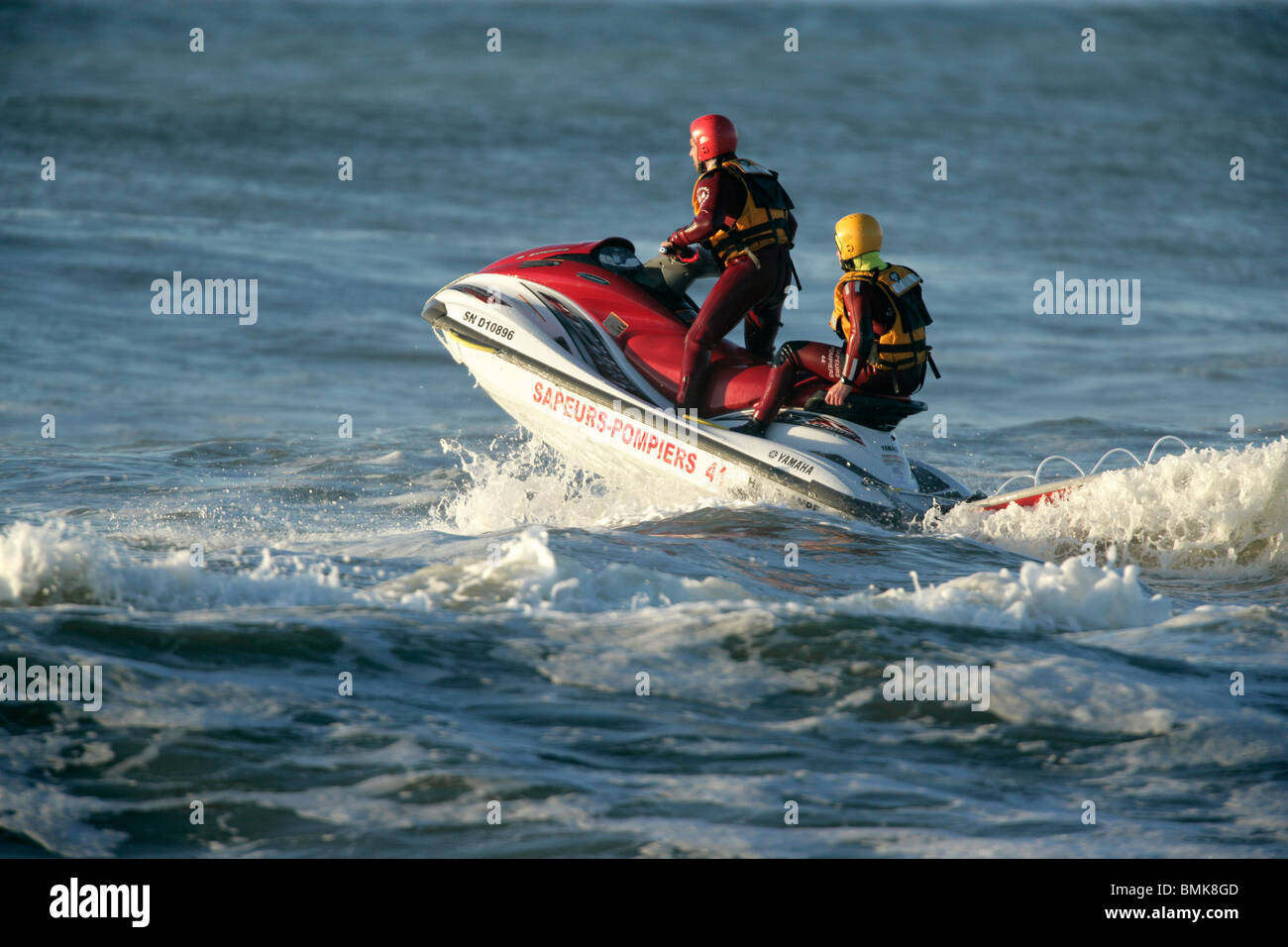 Firefighters on jet-skis Stock Photo - Alamy