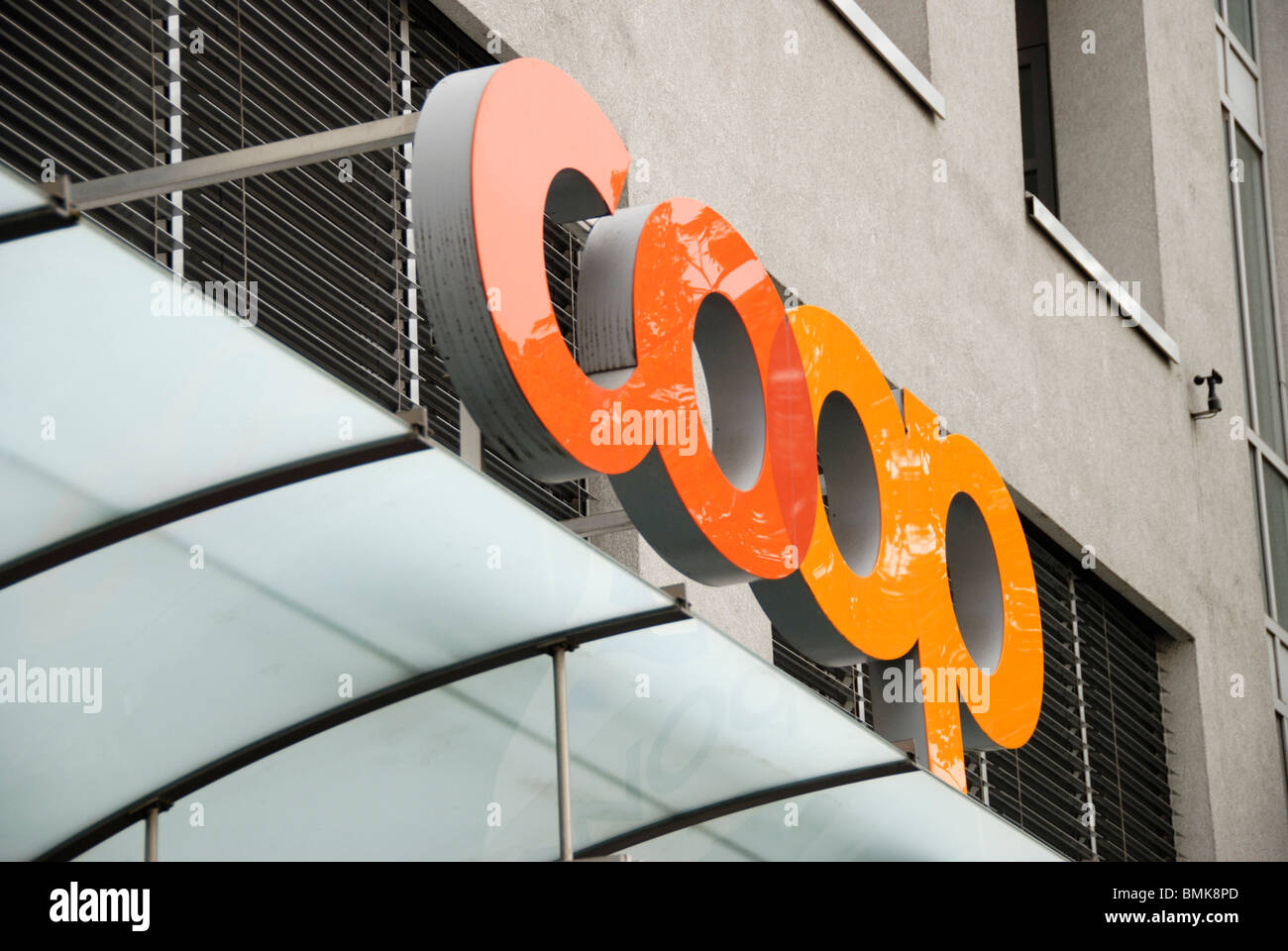 Close-up of Coop sign outside Swiss supermarket Stock Photo - Alamy