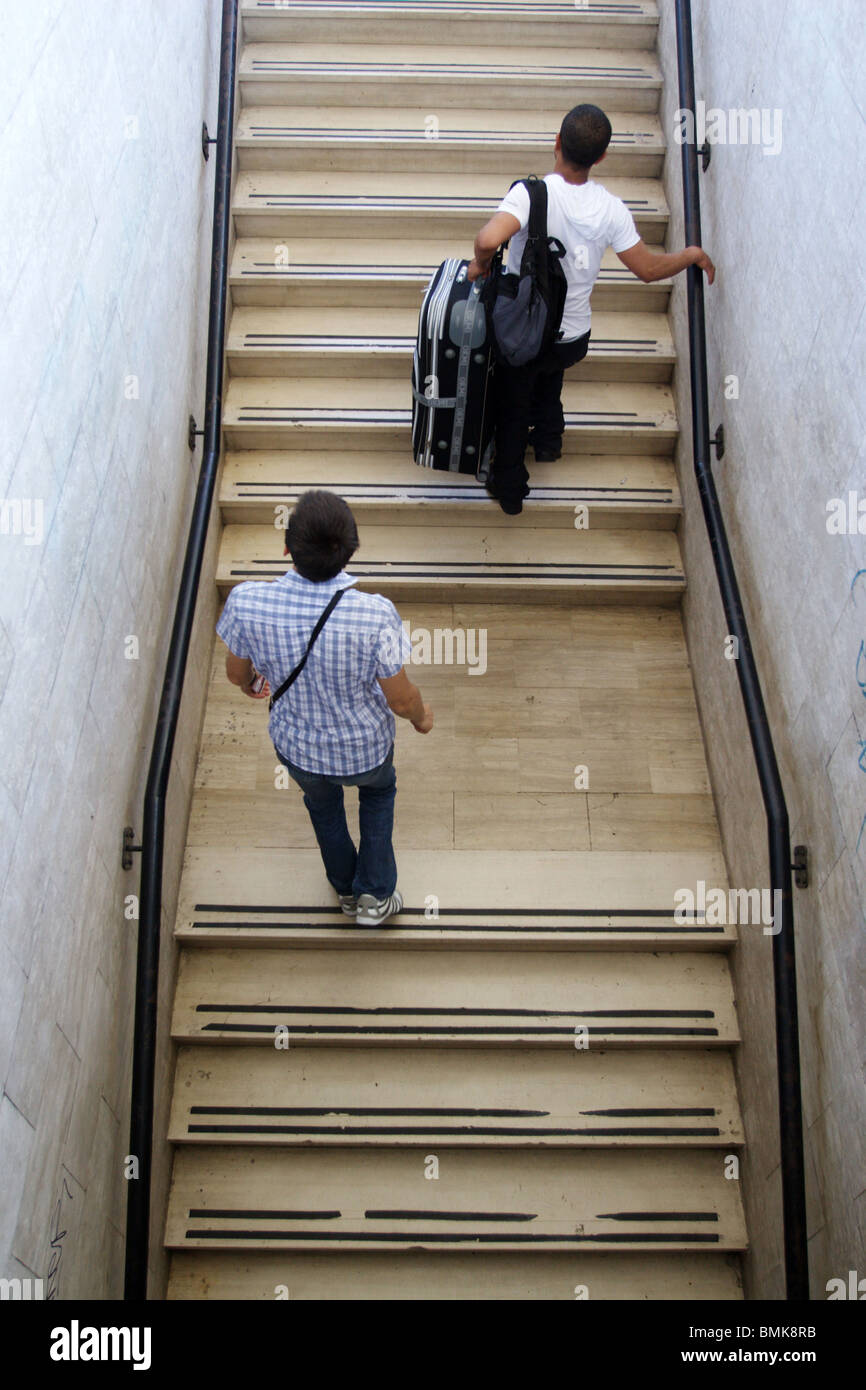 Group people climbing stairs street hi-res stock photography and images ...