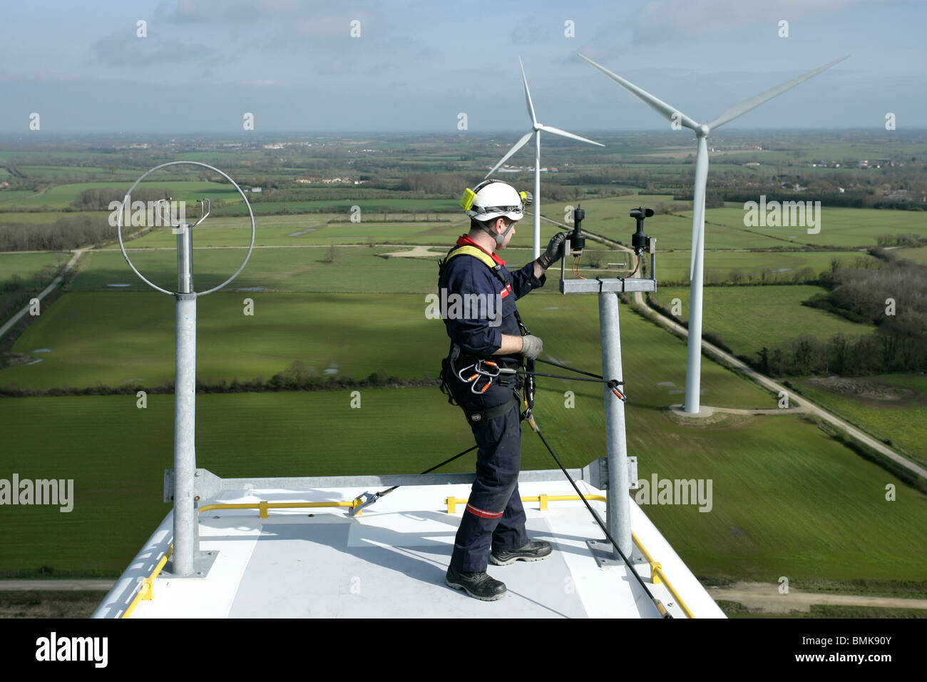 Photo: maintenance at the top of a windmill Stock Photo - Alamy