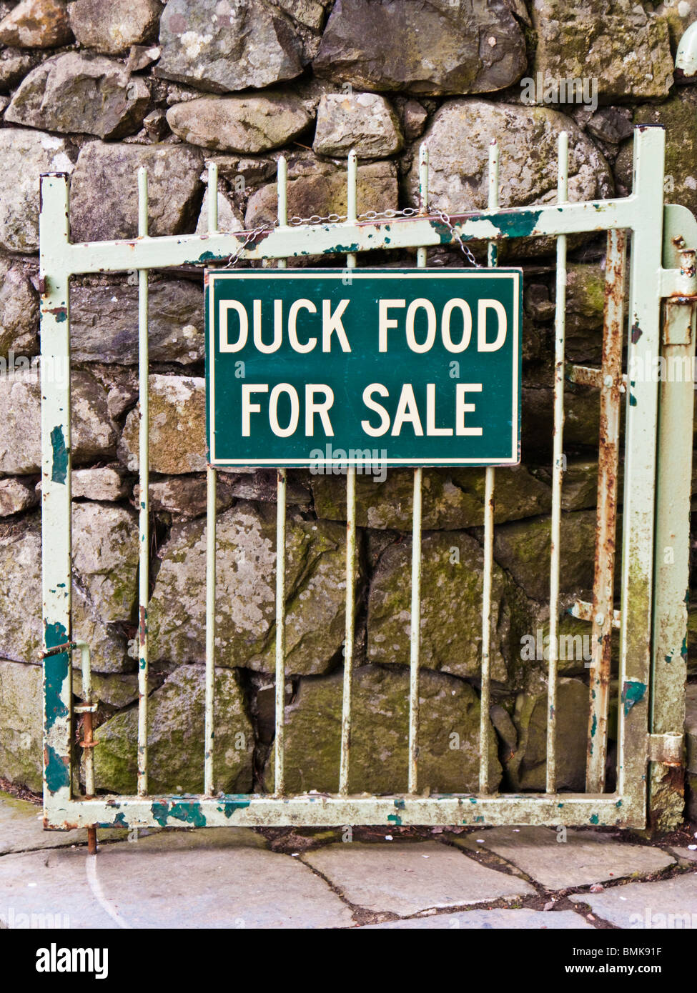 Duck Food For Sale sign on a gate England UK Stock Photo - Alamy