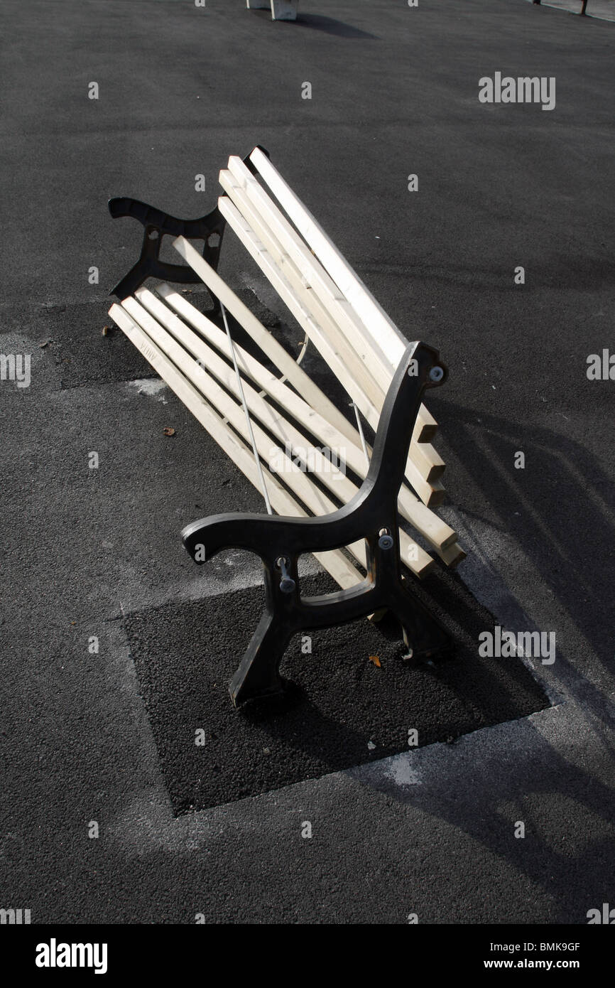 damaged park bench in city town Stock Photo - Alamy
