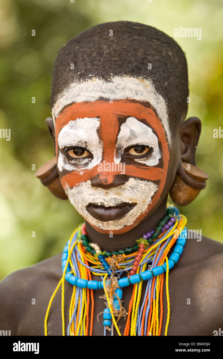 Ethiopia, Omo Region, Kibish Village. Grandson of chief Bologedung ...