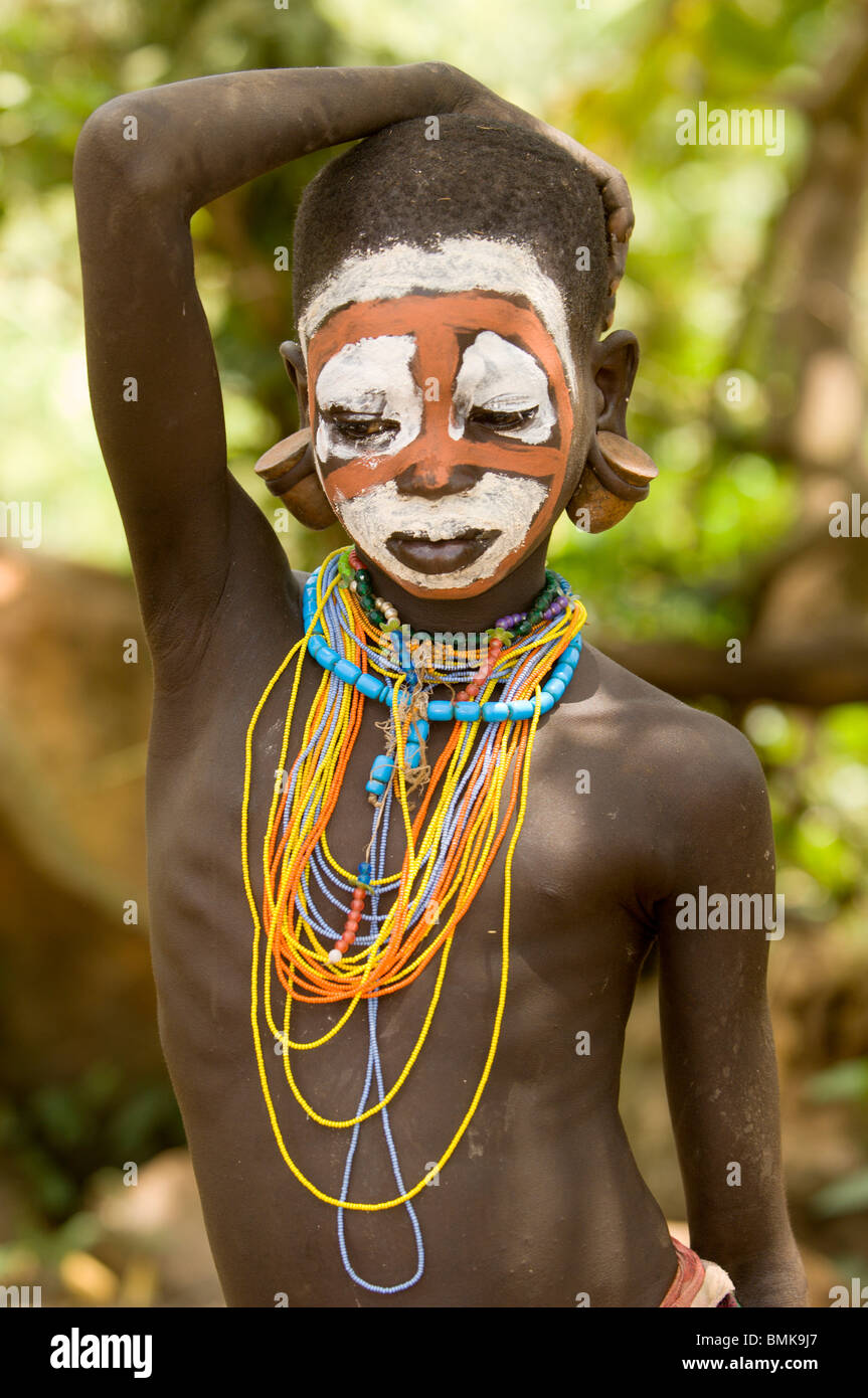 Ethiopia, Omo Region, Kibish Village. Grandson of chief Bologedung ...