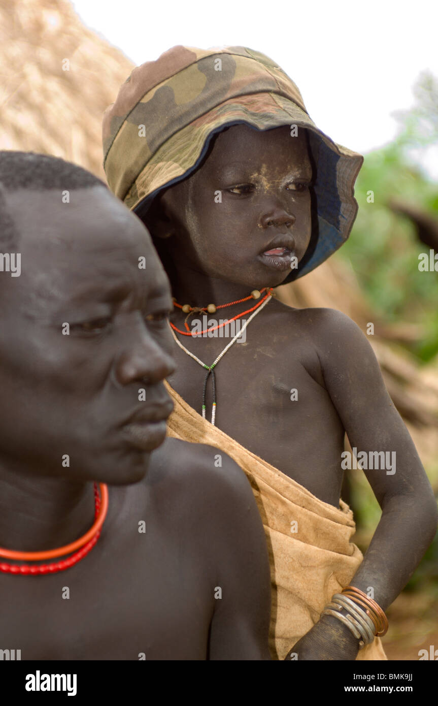 Ethiopia, Omo Region, Kibish Village. Suri tribe father and son Stock ...