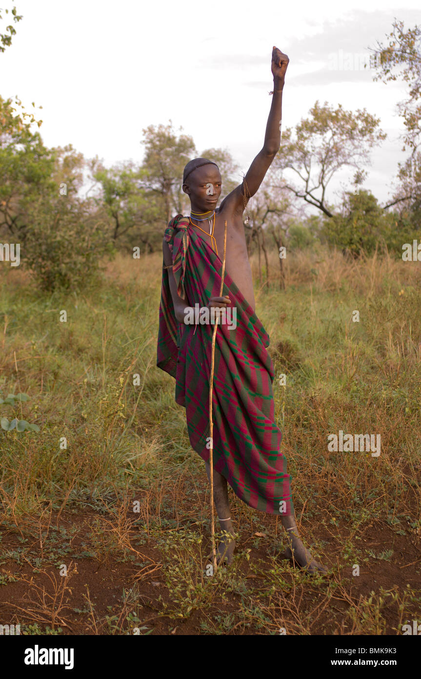 Ethiopia, Omo Region, Tulgit. Lone Suri man standing in the bush Stock ...