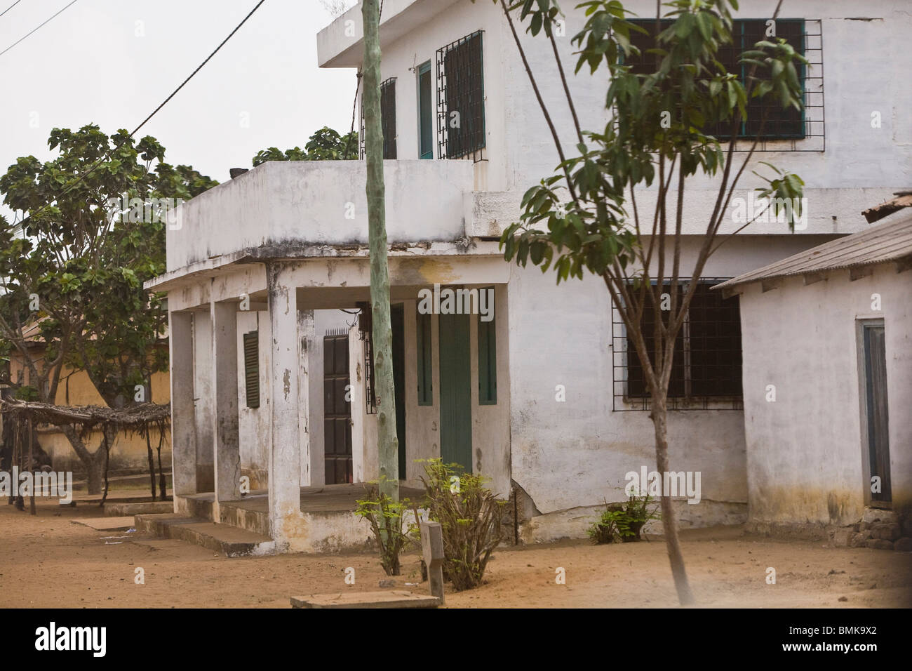 Africa, West Africa, Ghana, Coastal Road. White house and trees Stock ...