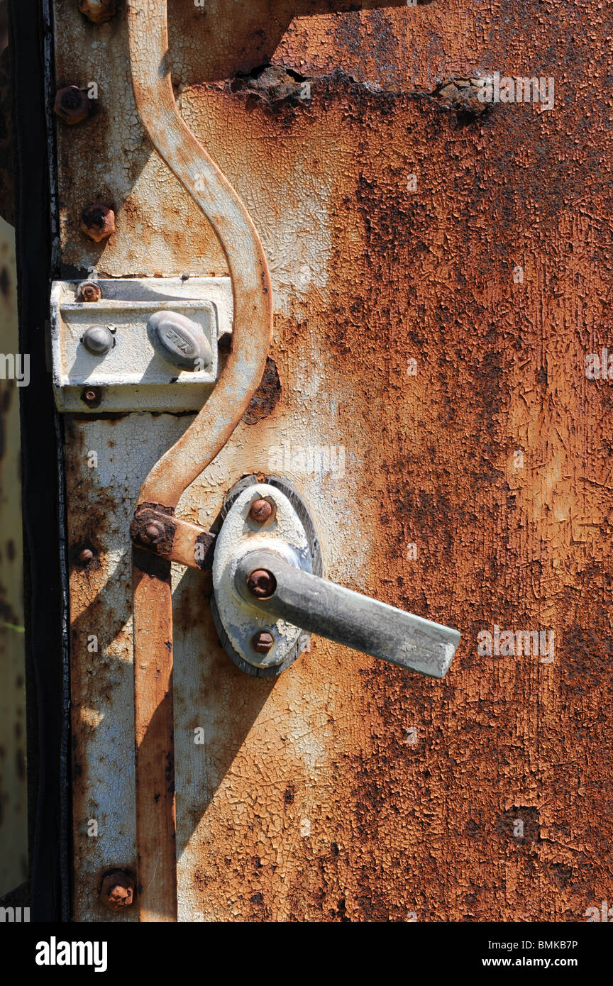Rusty metal door on abandoned military vehicle at Fortress La Mola ...