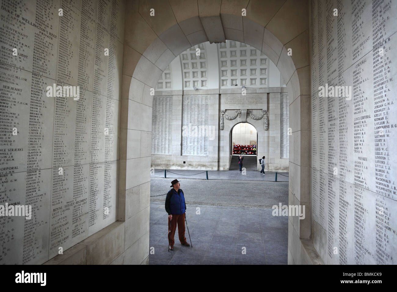 A visitor takes a look at some of the 54,896 names on the Menin Gate ...