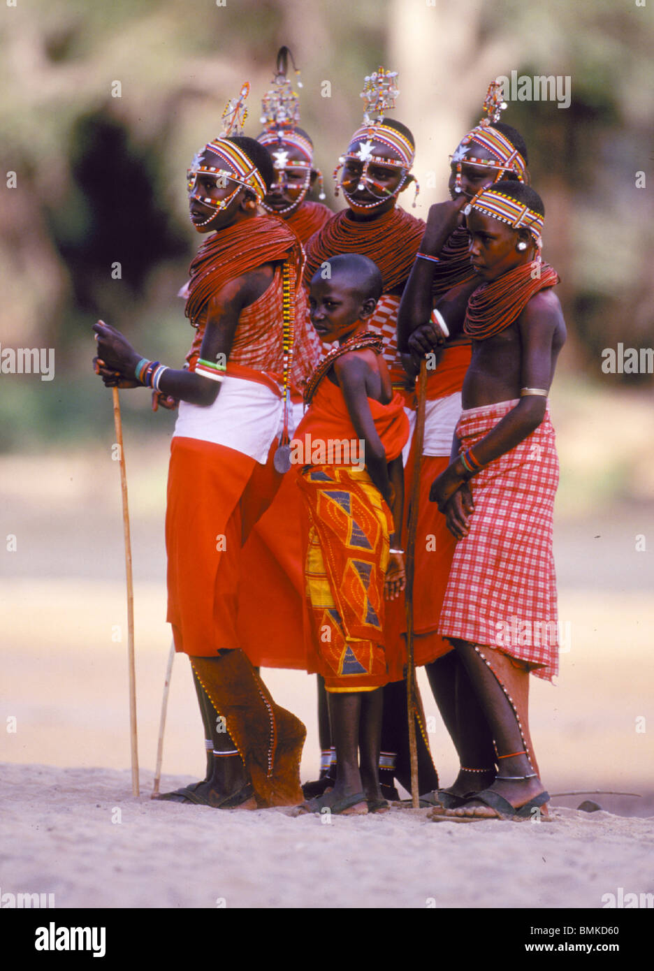 Africa, Kenya, Samburu. Samburu National Reserve. Samburu girls watch ...