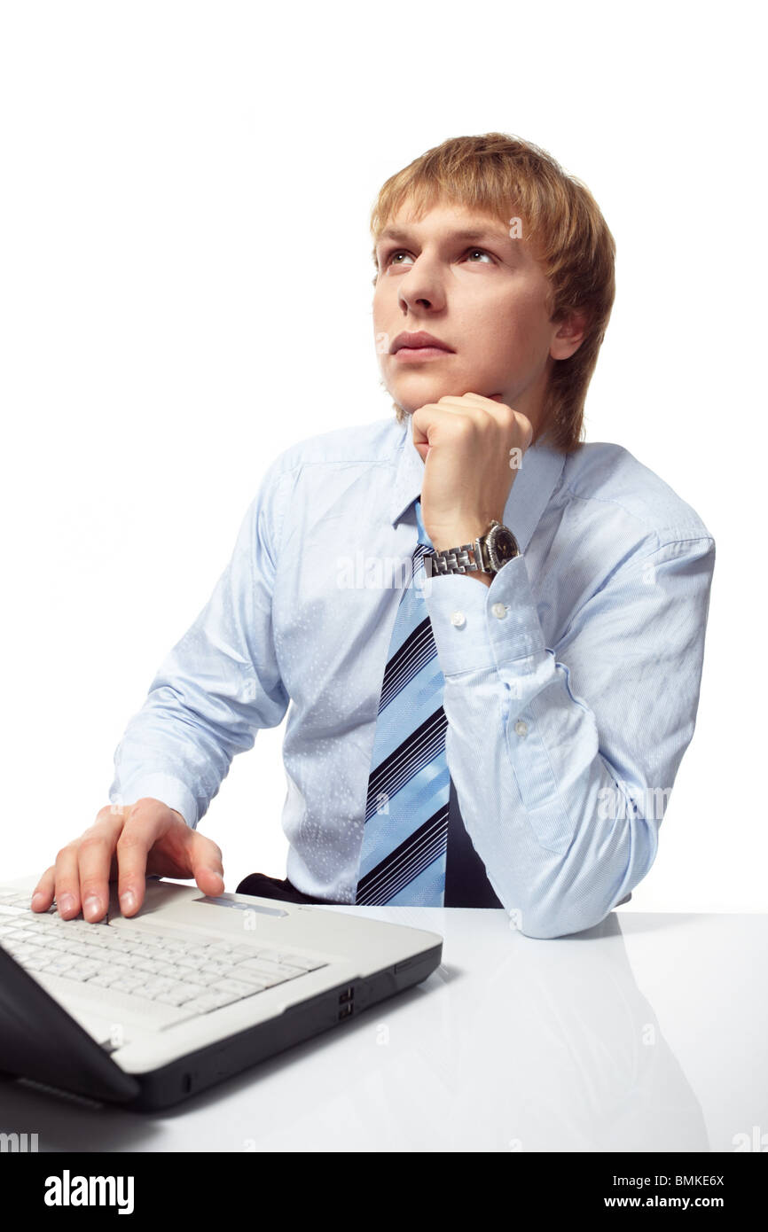 Young man with laptop Stock Photo - Alamy